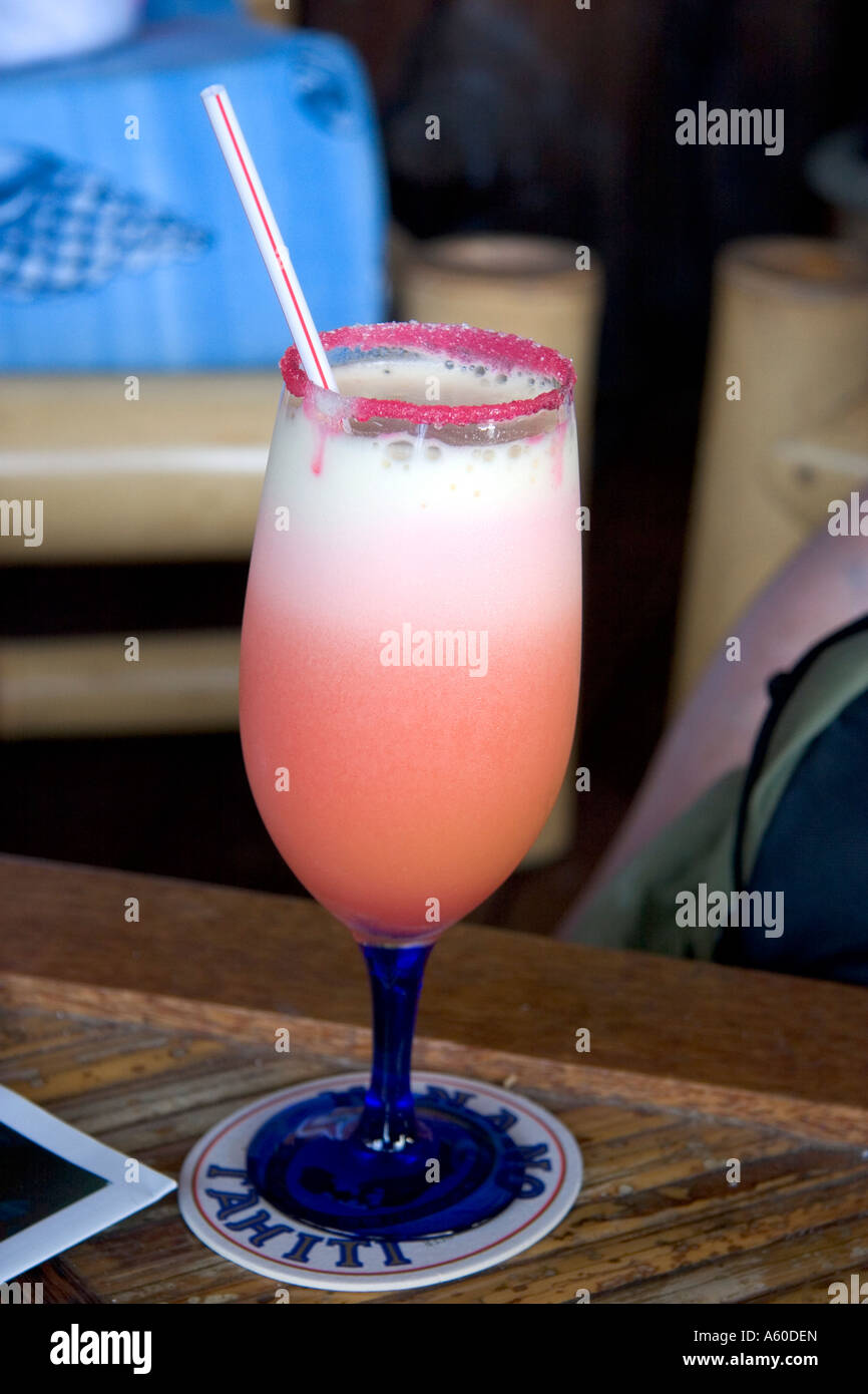 A tropical beverage at a restaurant on the island of Moorea Stock Photo ...