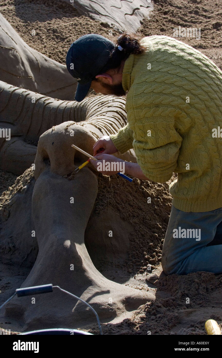 Man making sand sculpture Stock Photo - Alamy
