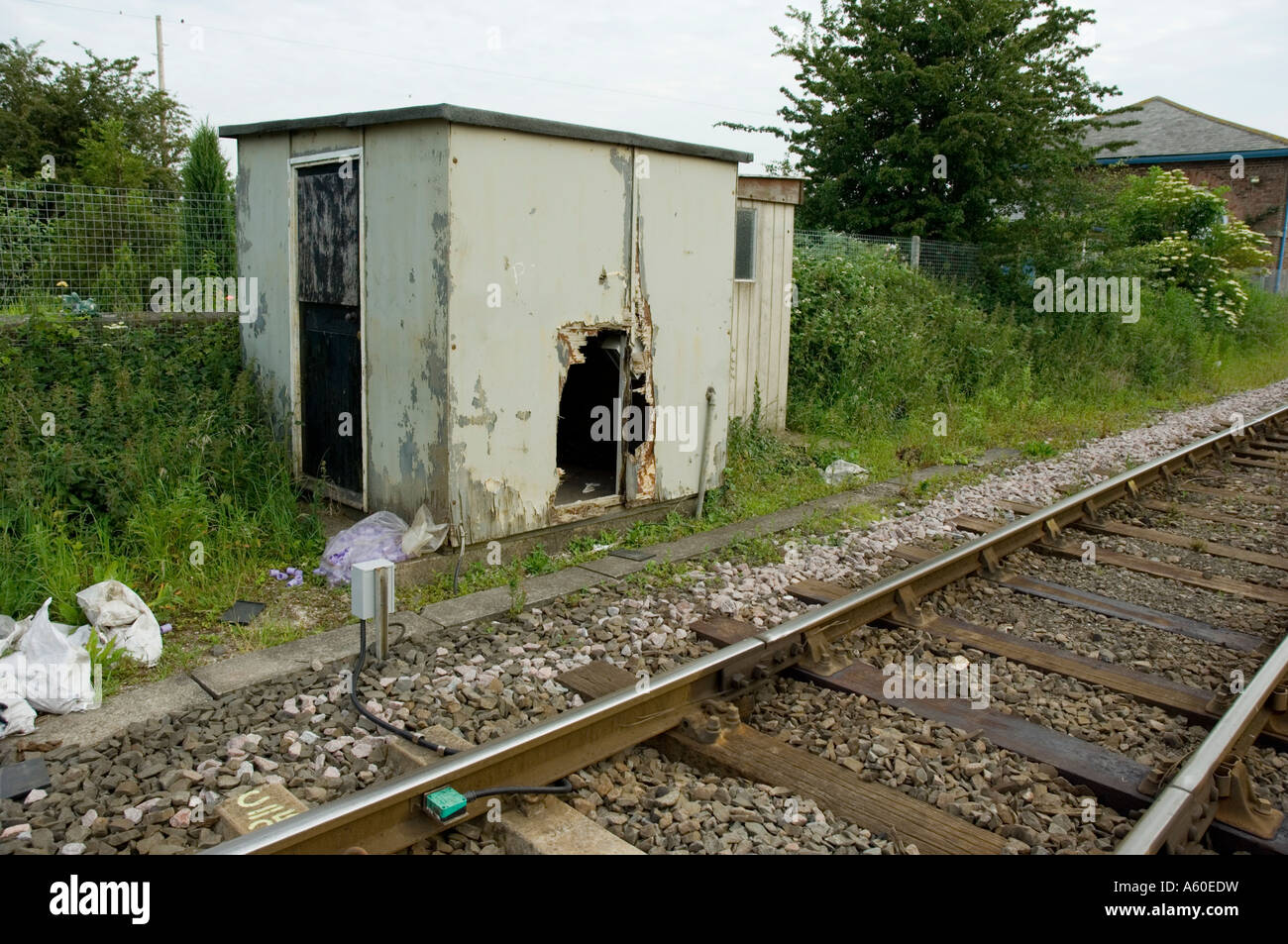 Damage caused by vandals to railway shed Stock Photo - Alamy