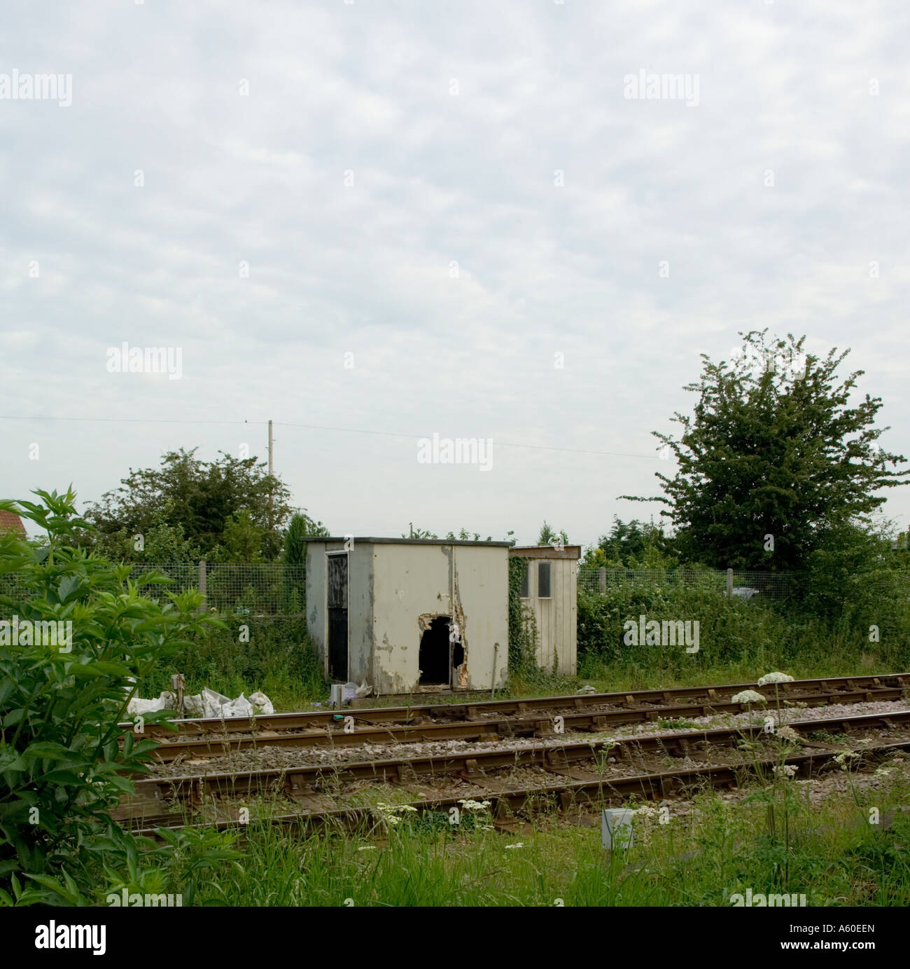 Damage caused by vandals to railway shed Stock Photo - Alamy