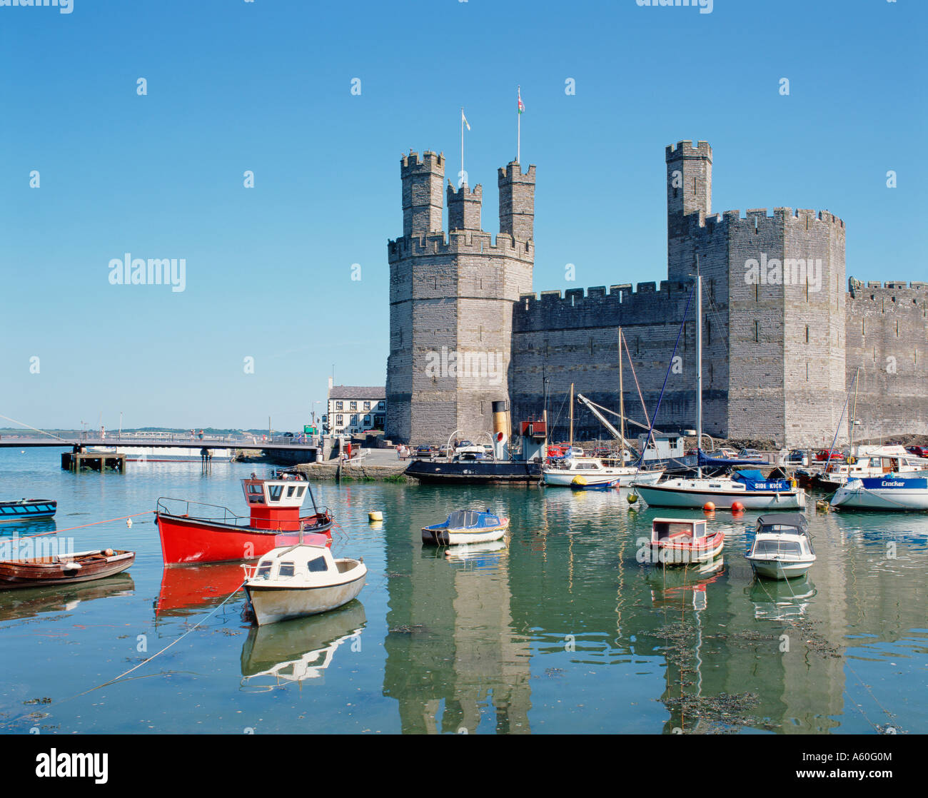 Caernarfon castle with boats hi-res stock photography and images - Alamy