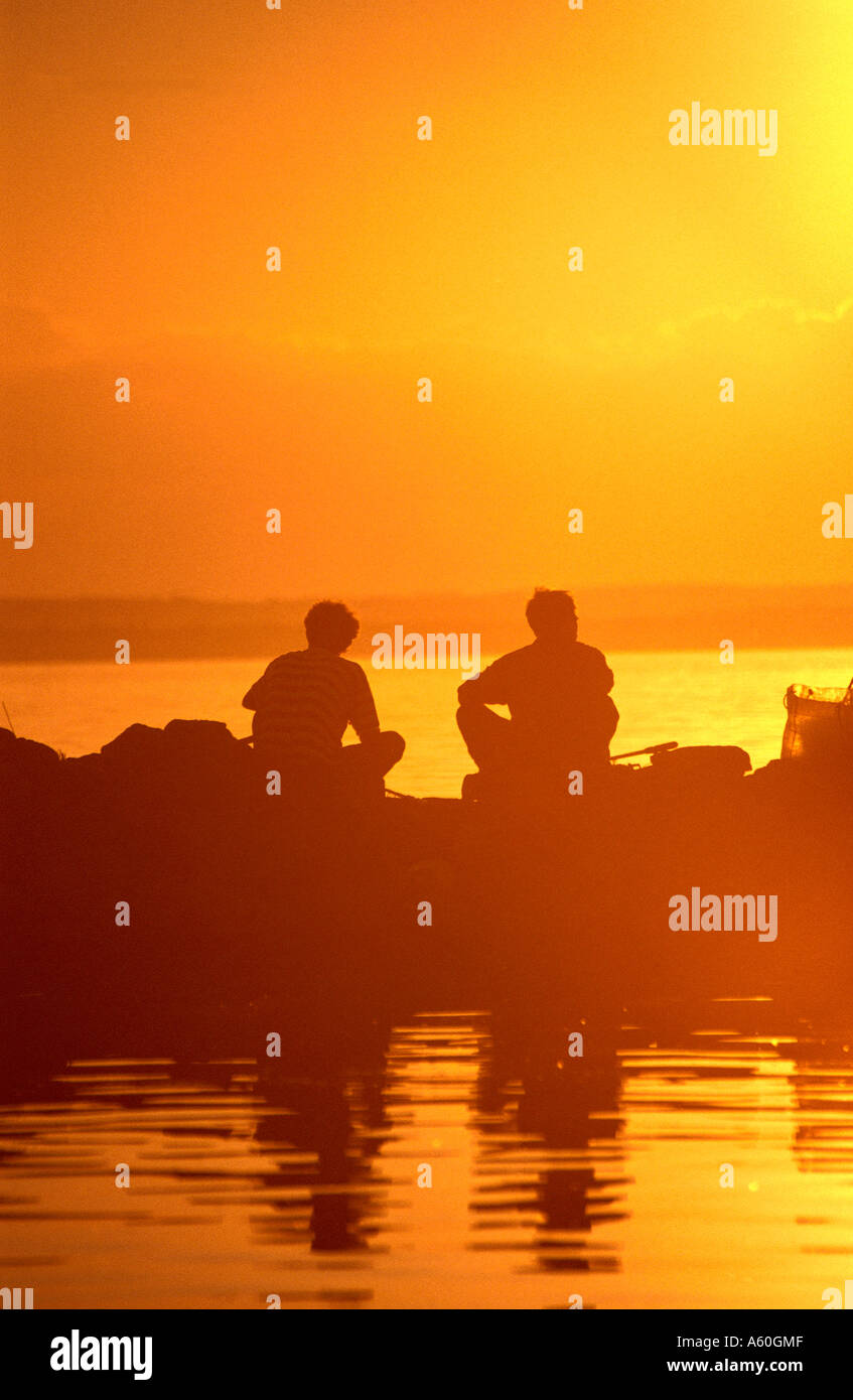 Silhouette of fishermen fishing in lake Lake Balaton Hungary Stock ...