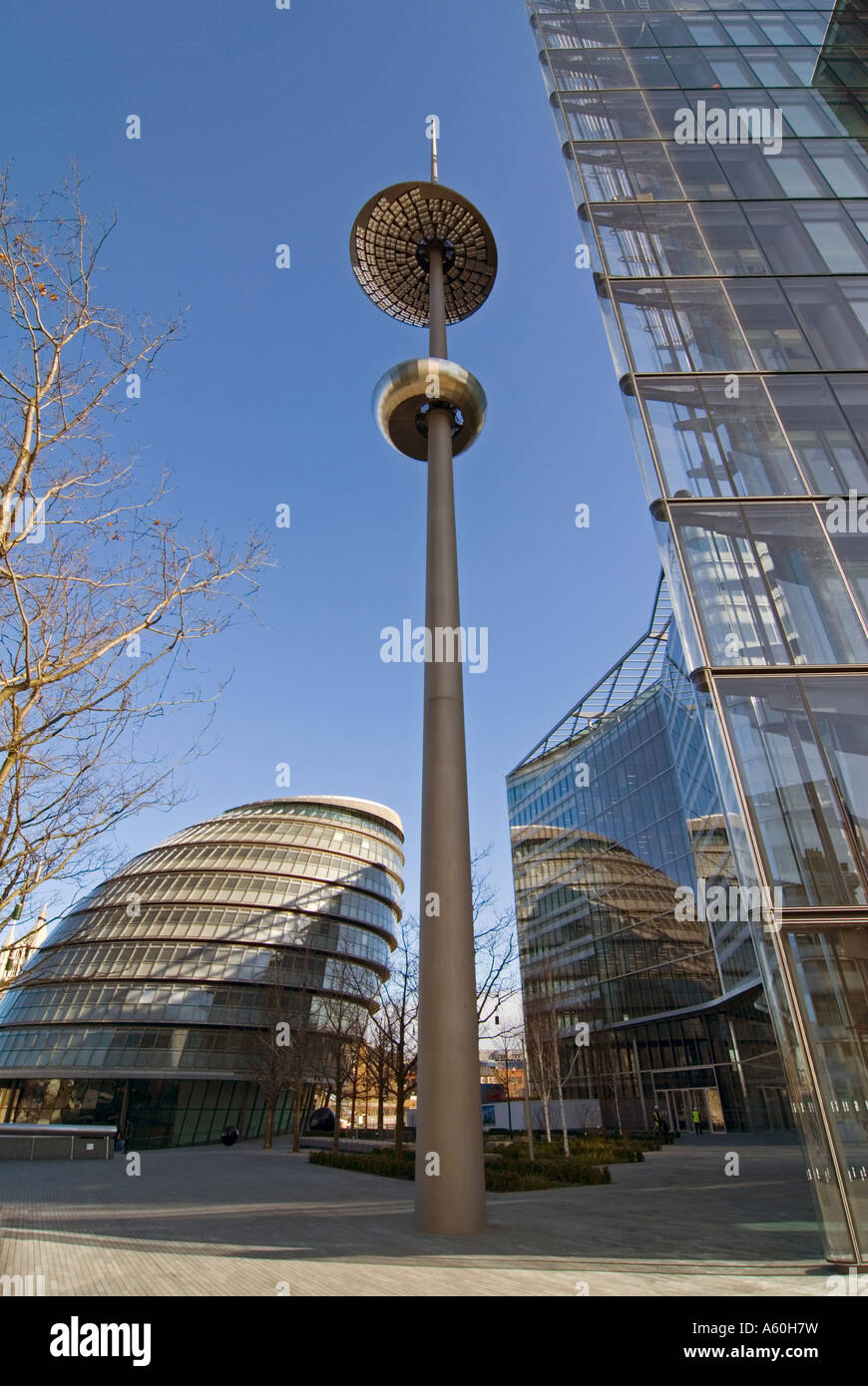 Vertical wide angle exterior of the City Hall and the new "More" London ...