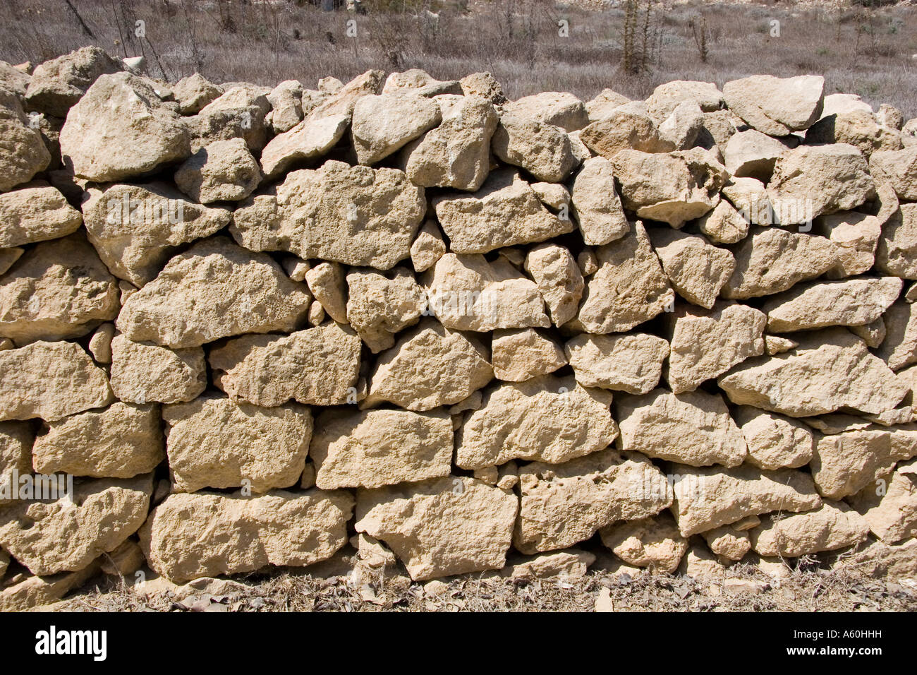 Cypriot dry stone wall Stock Photo - Alamy