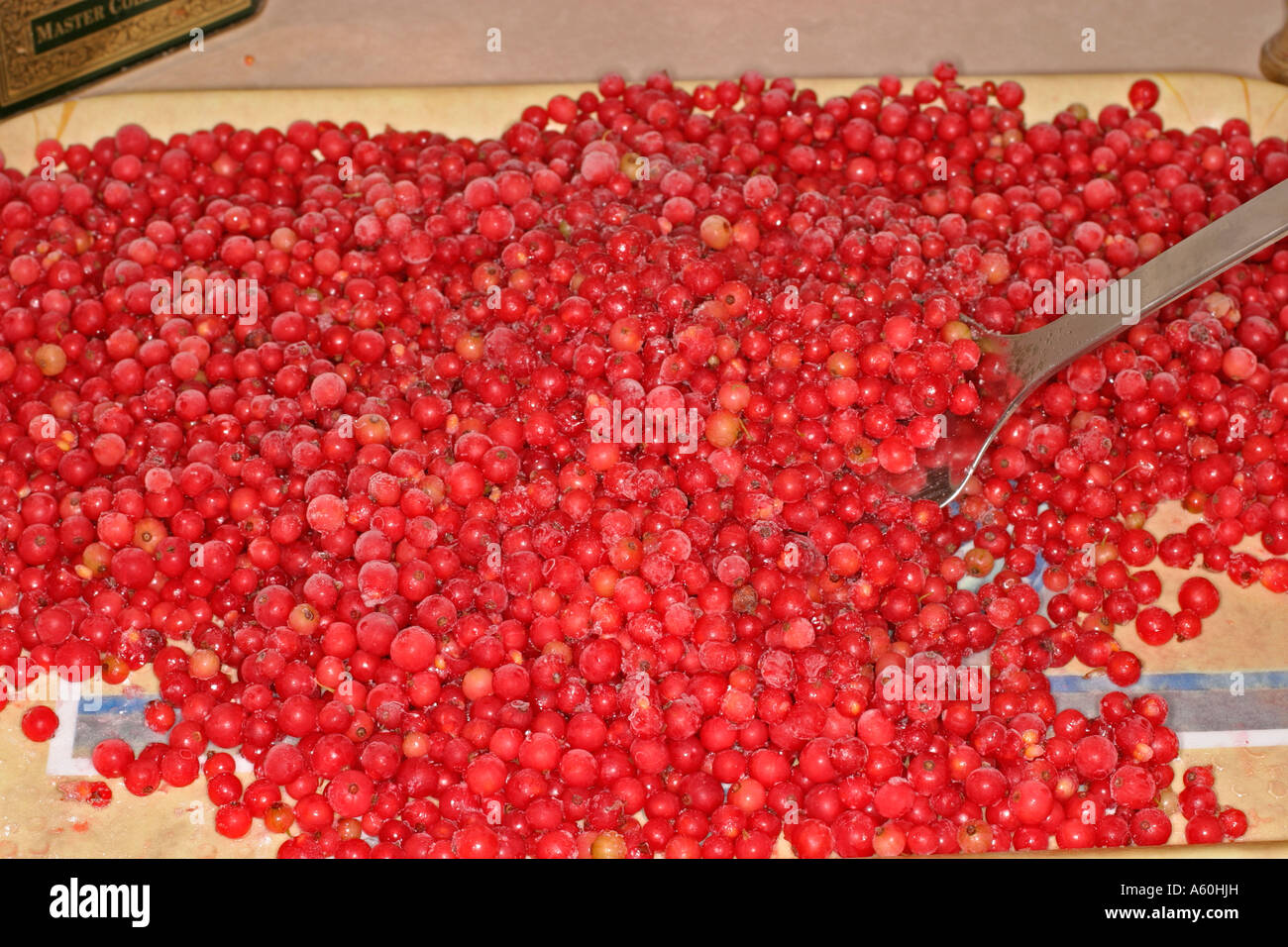 red currents Red lake use slice to separate frozen fruit on tray Stock ...