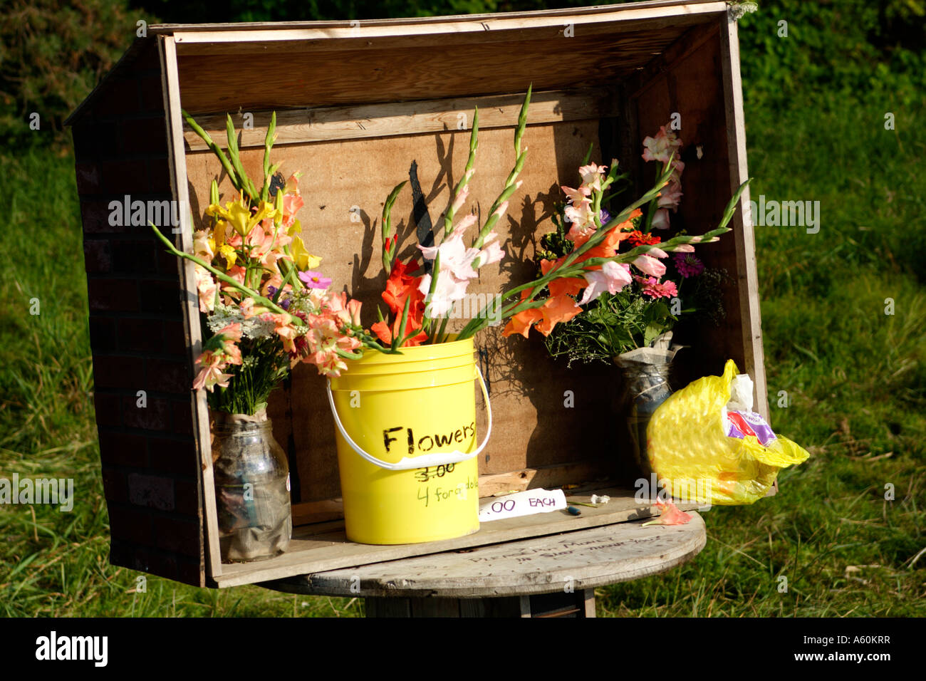 Roadside flower stand Stock Photo - Alamy