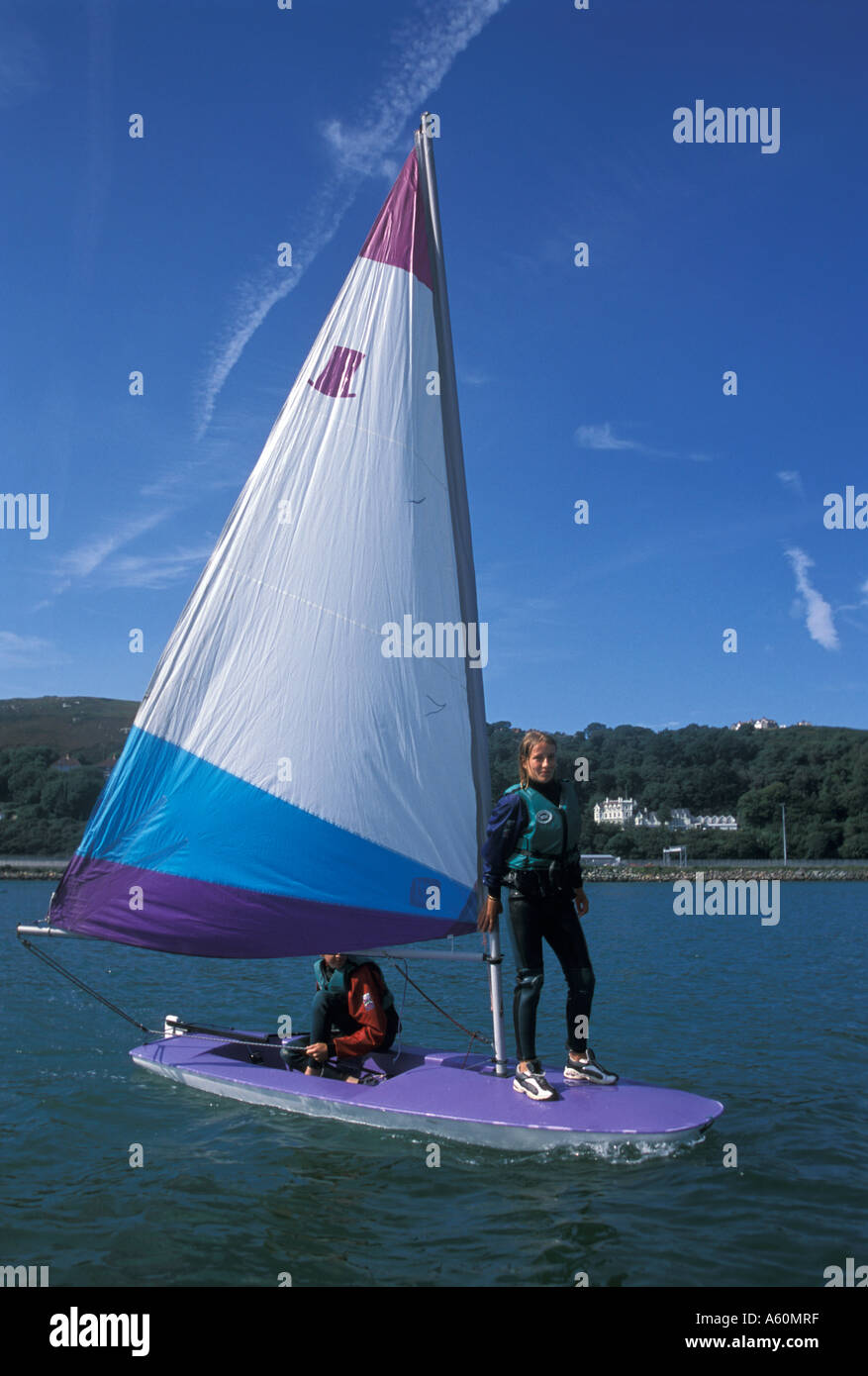 Learning to sail on Toppers, Goodwick, Wales, UK, Europe Stock Photo ...