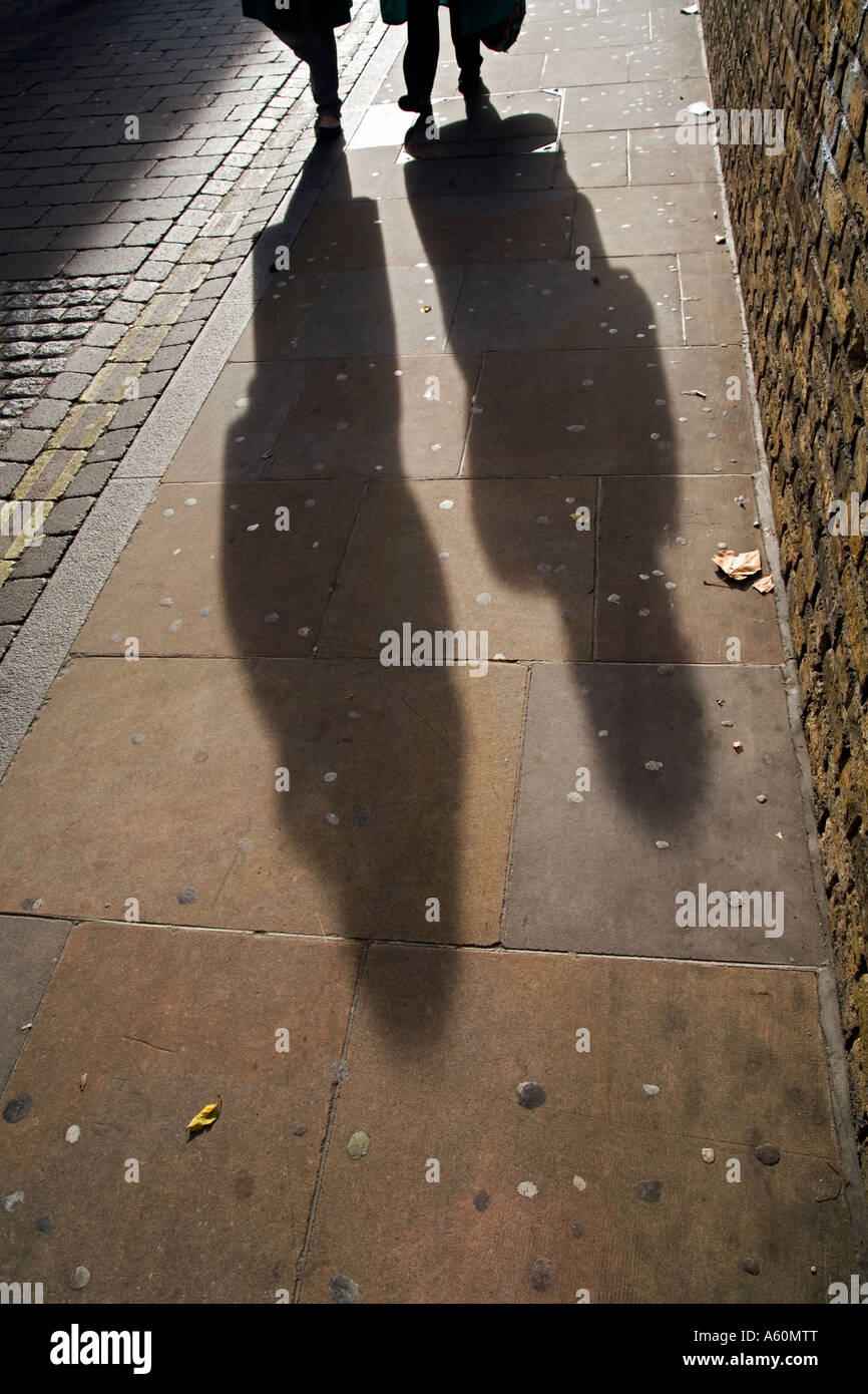 Shadows on pavement on a sunny day Stock Photo - Alamy