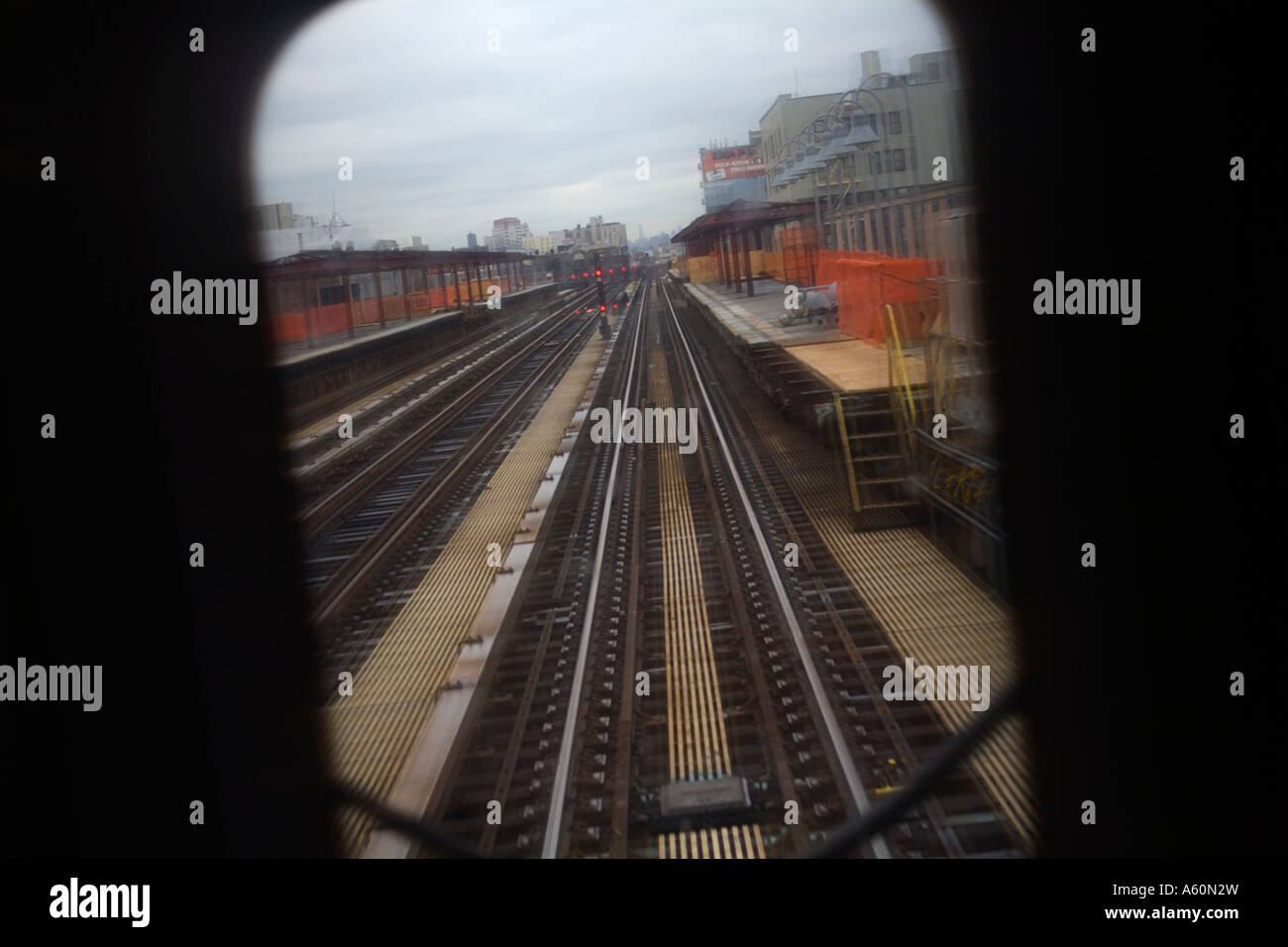 Subway track through train window Stock Photo - Alamy