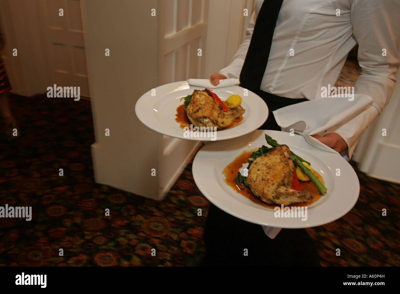 Serving dinner at the restaurant Stock Photo - Alamy