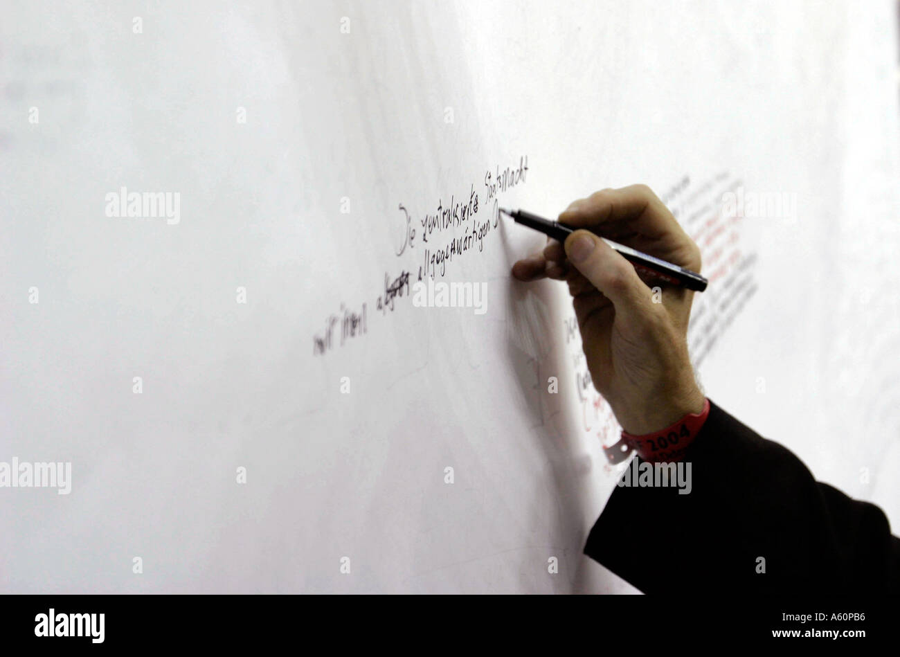 Hand writing on sheet of paper Stock Photo - Alamy