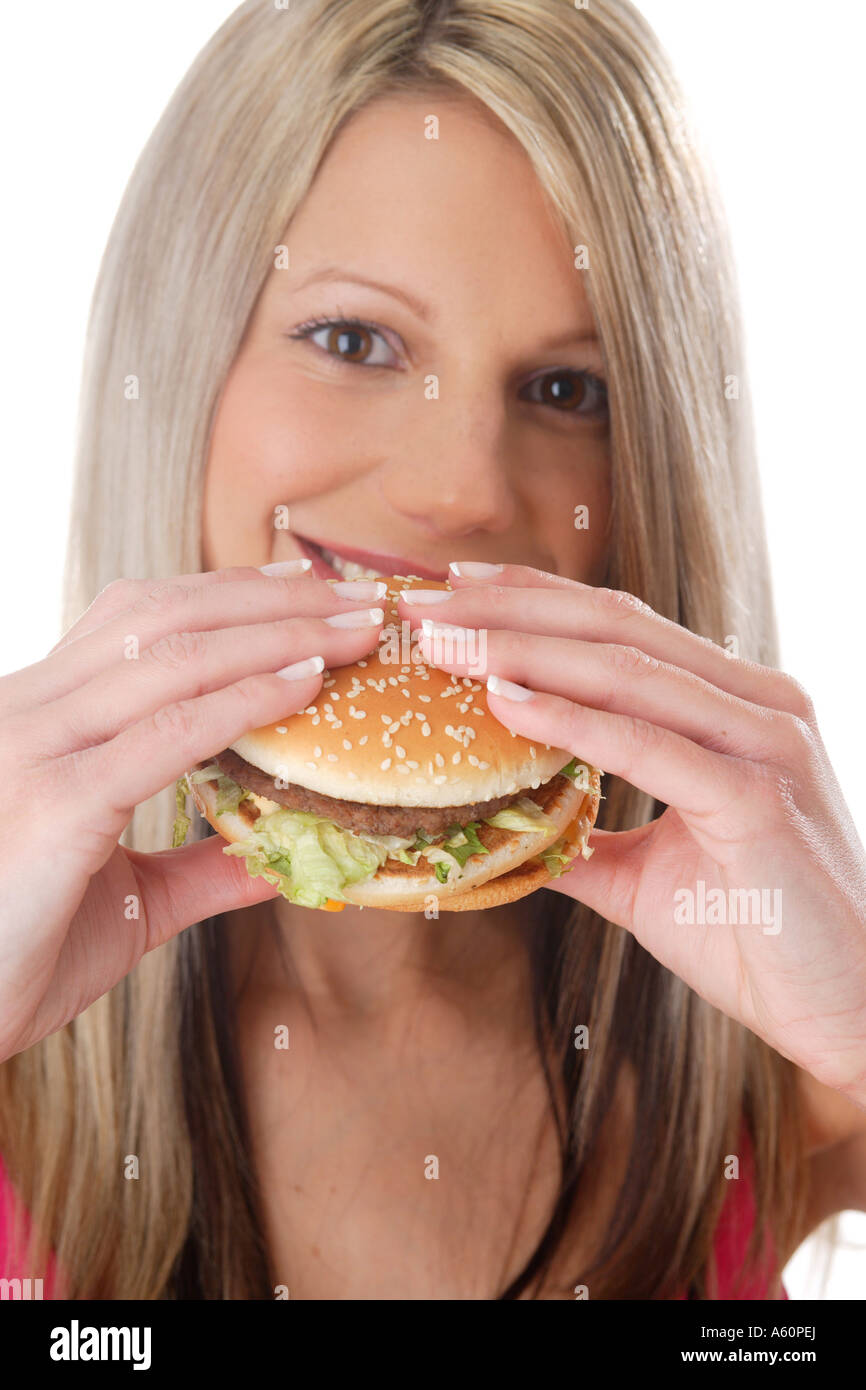 Beautiful woman eating hamburger closeup hi-res stock photography and ...