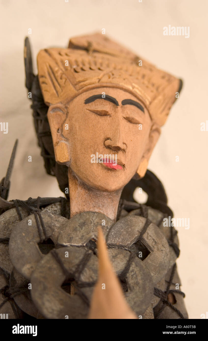 Balinese figure of a reverent man Stock Photo - Alamy