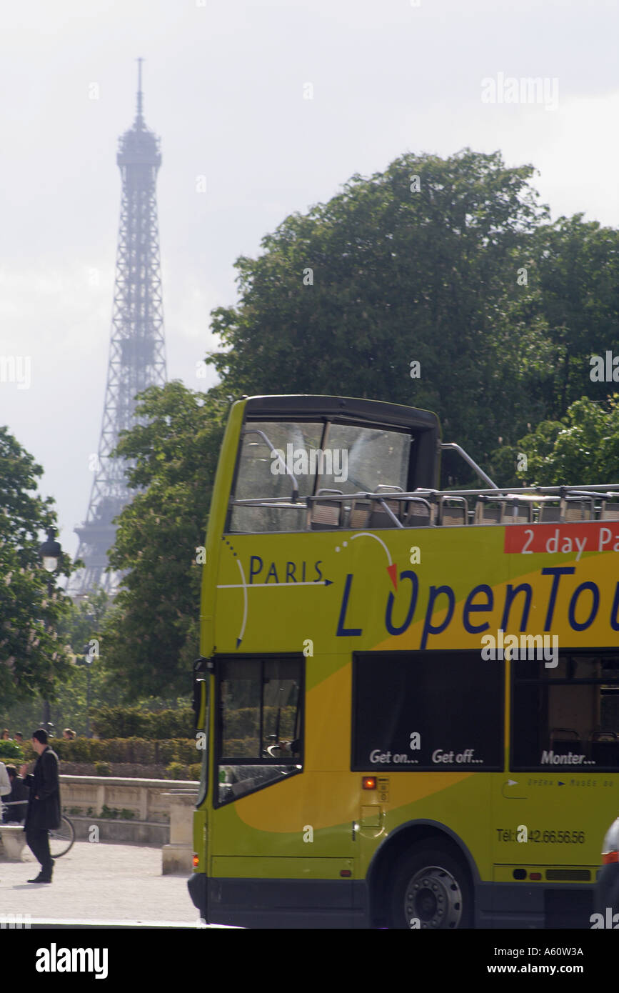 Open top tourism bus with the Eiffel Tower in the background Stock ...