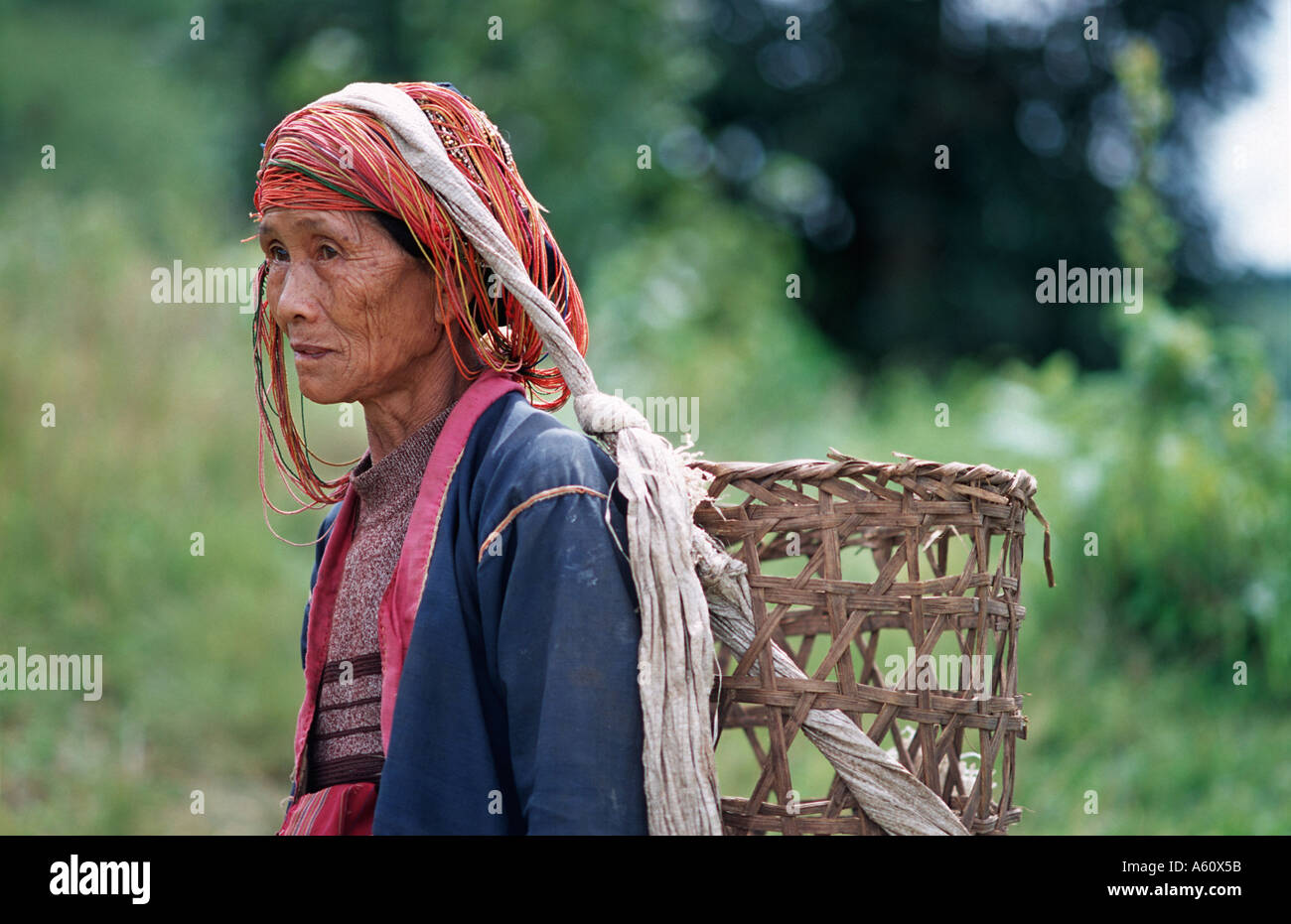 Elderly Palaung woman in distinctive tribal dress Trekking out of Kalaw ...