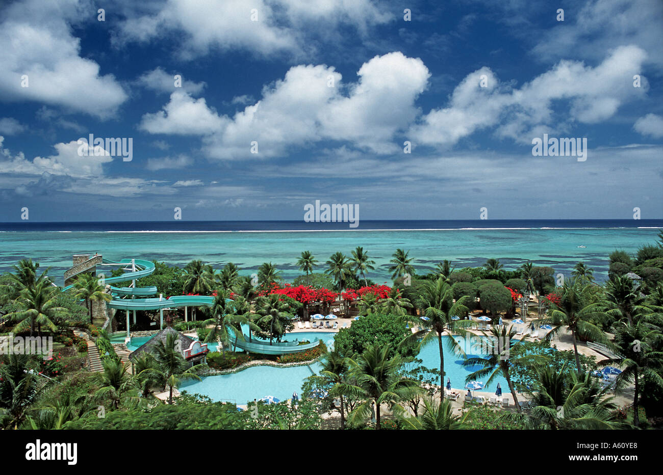 Pools of the Nikko Saipan hotel and the sparkling turquoise waters of ...