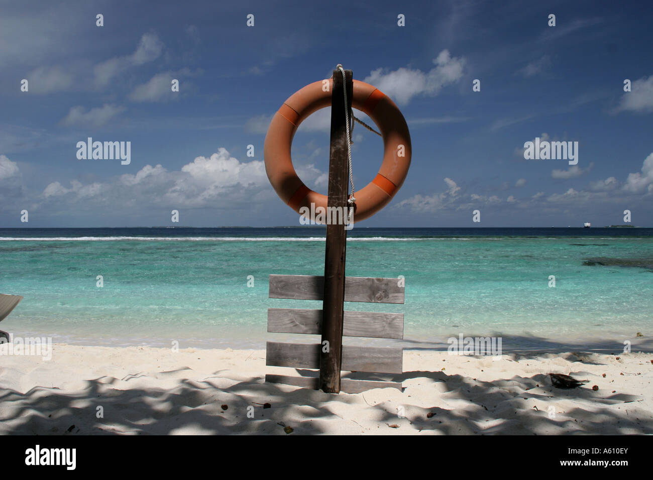 life ring on post at Beach in Bandos, Maldives Stock Photo - Alamy