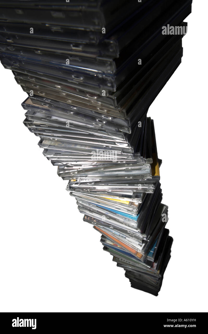 looking down at a very tall stack of cd case on top of each over Stock ...