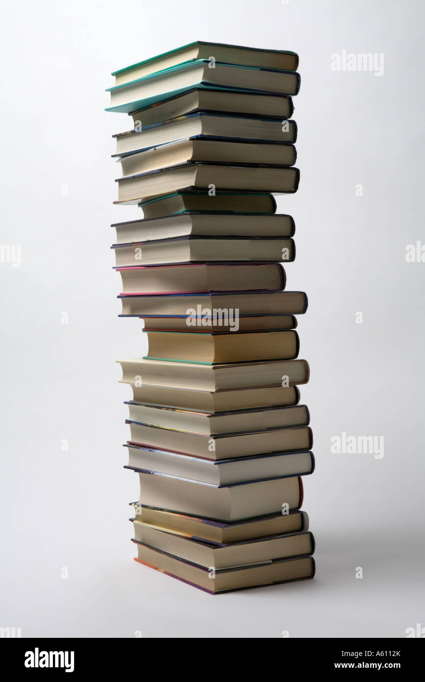 tall stack of hardback books Stock Photo - Alamy