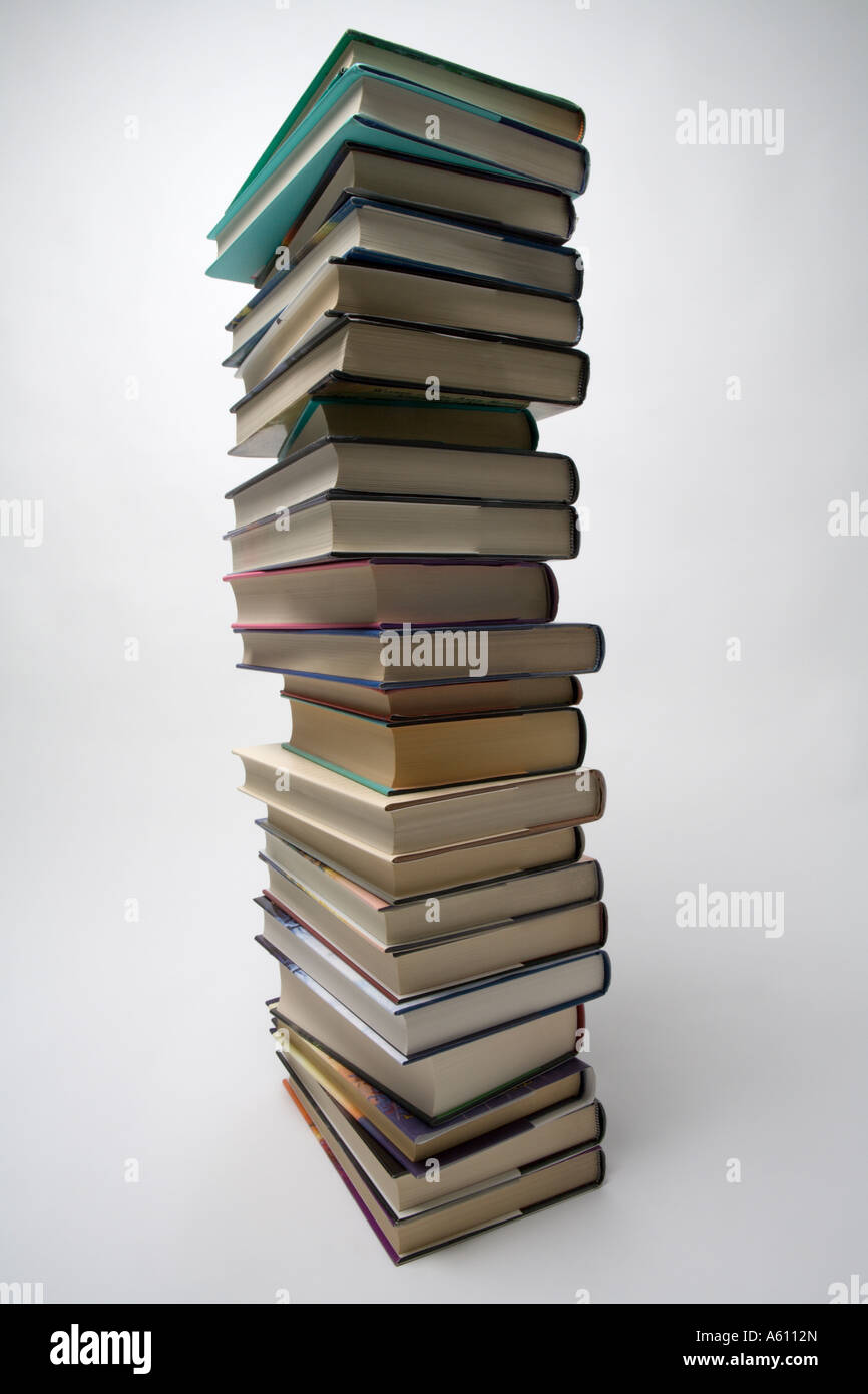 tall stack of hardback books Stock Photo - Alamy