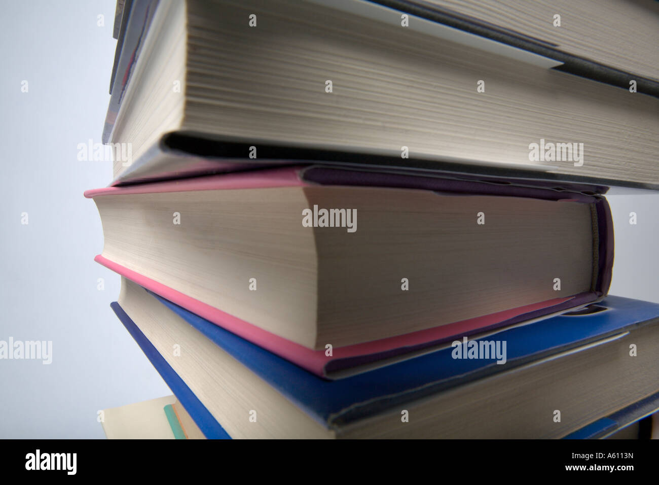 tall stack of hard back books Stock Photo - Alamy