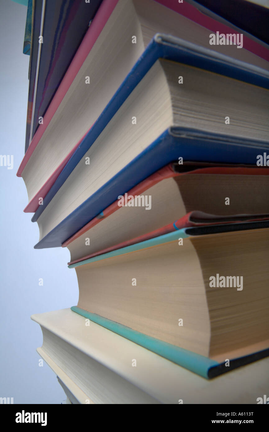 tall stack of hard back books Stock Photo - Alamy