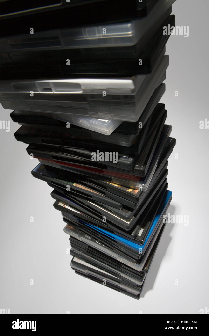 tall stack of dvd cases looking down, two of three images this one has ...