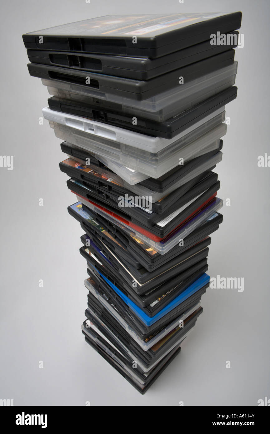 tall stack of dvd cases looking down, side view of a tall stack of dvd ...