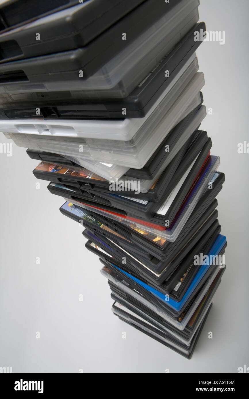 tall stack of dvd cases looking down, close up from the side of a stack ...