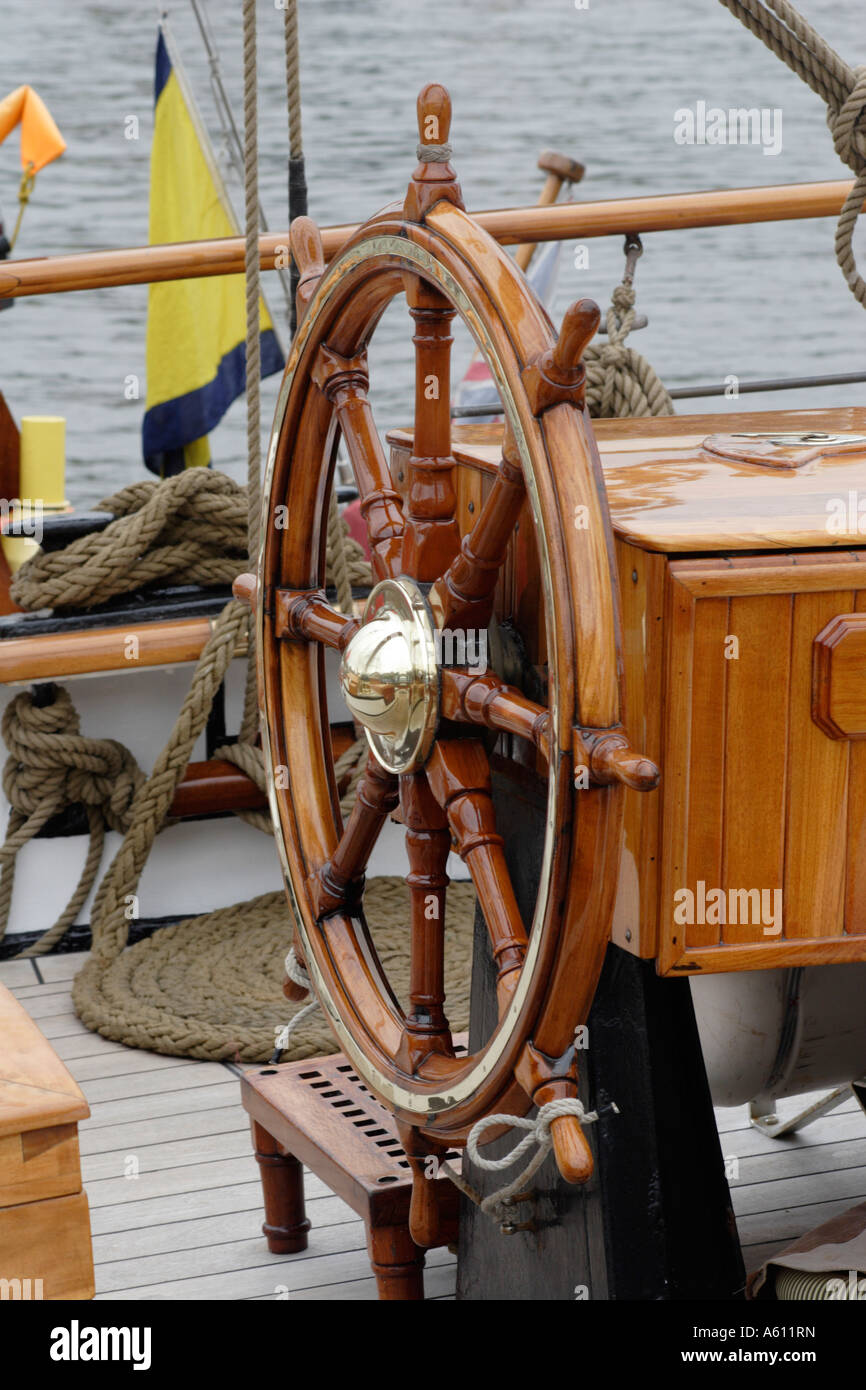 Highly polished wooden wheel of a sailing ship Stock Photo - Alamy