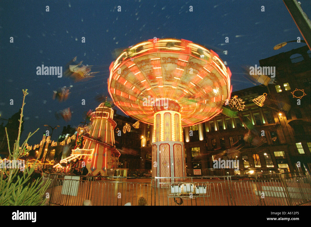 Swing ride in George Square, Glasgow Stock Photo - Alamy