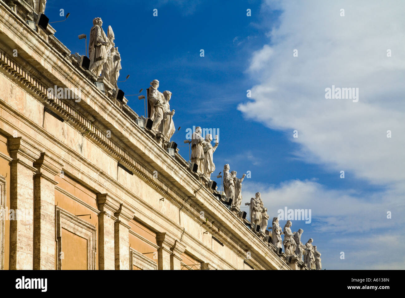 Statues on the roof of St Peter s basilica overlooking Piazza San ...