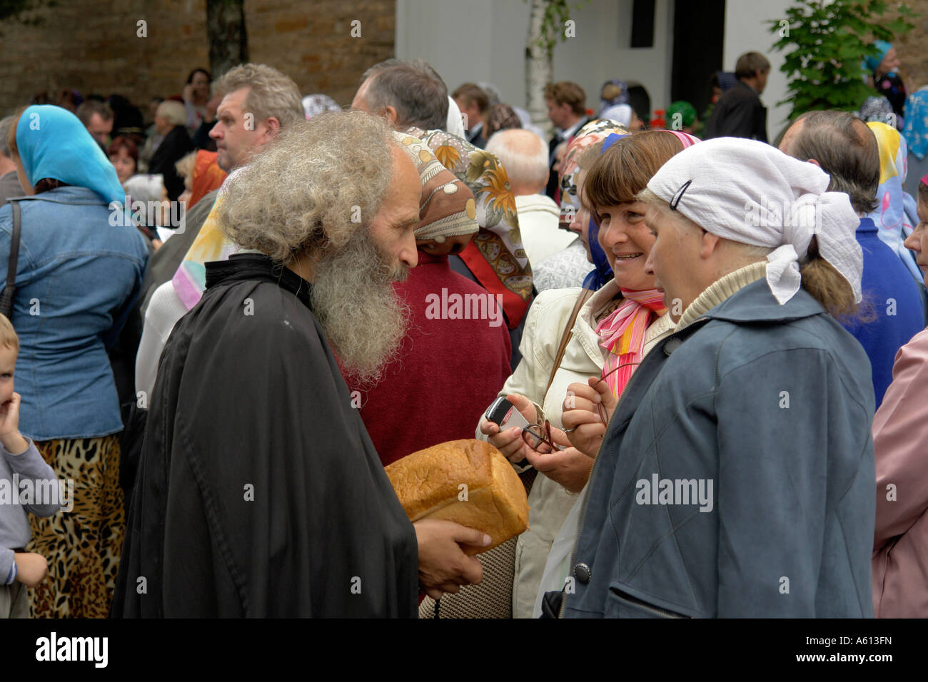 Painet jj1856 russia monk priest offering bread talking pilgrims ...