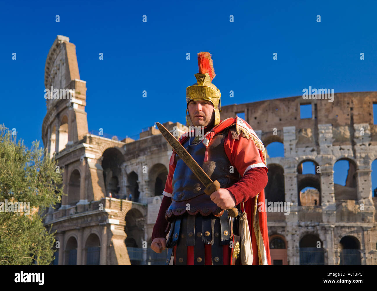 Roman soldier posing for tourists outside the Colosseum Rome Italy ...