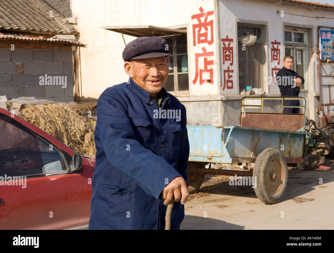 Old chinese man walking stick hi-res stock photography and images - Alamy