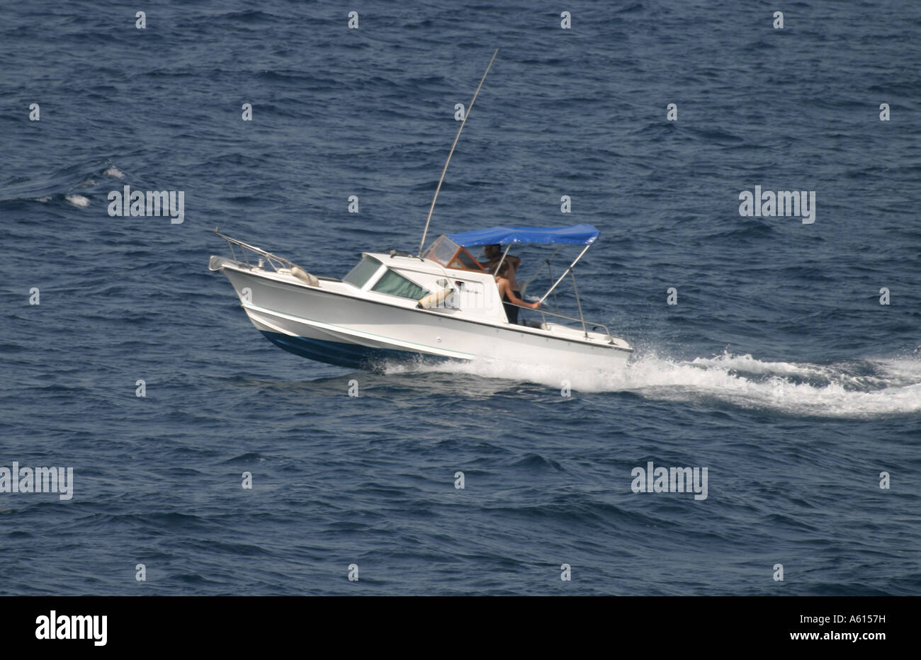 Speed boat off coast of Malta Stock Photo - Alamy