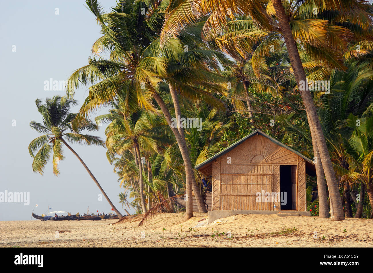 Decorative wicker hut amongst the palm trees on the beach at Kattoor ...