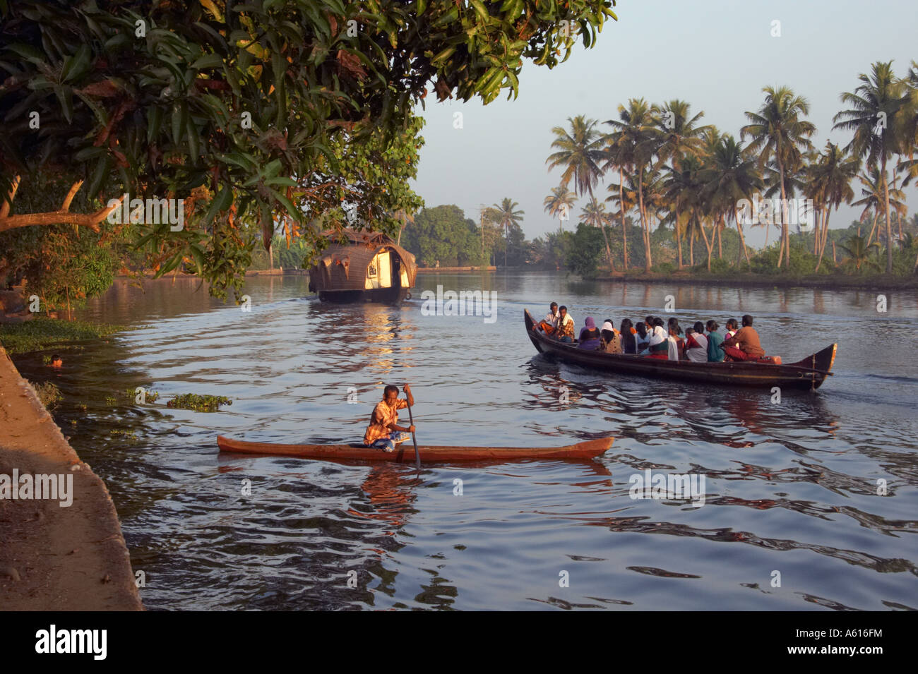 Early morning activity Women being ferried on the Kuttanad the ...