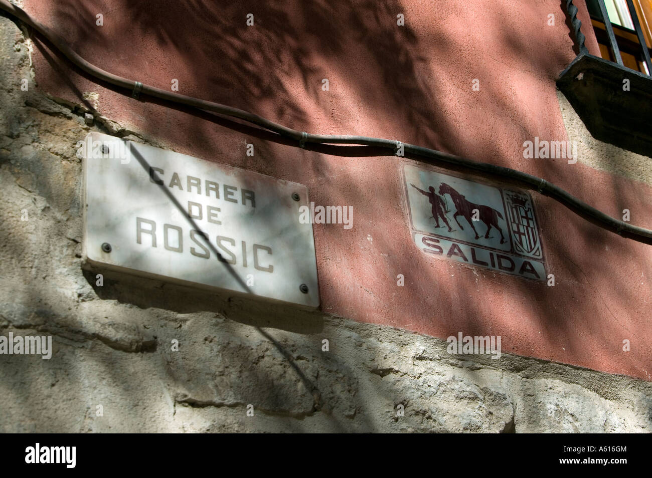 Old style street signs on weathered wall Carrer de Rossic Born district ...