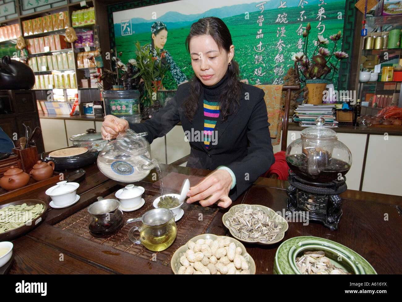 Tea merchant Lin Guang Xia serving fine Chinese green tea in ...