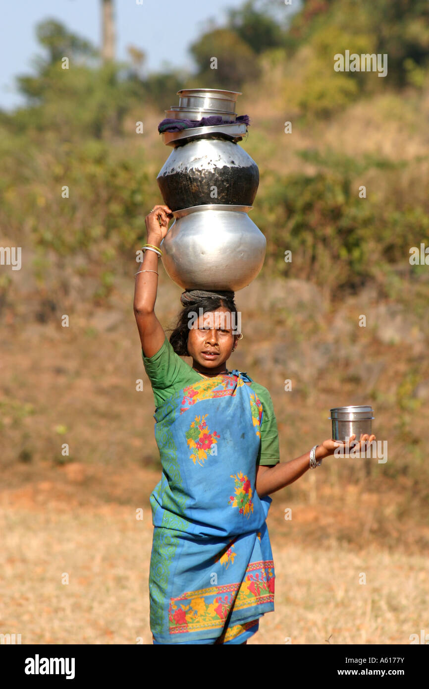 Gadaba tribal woman carrying pots on her head .Orissa India Stock Photo ...