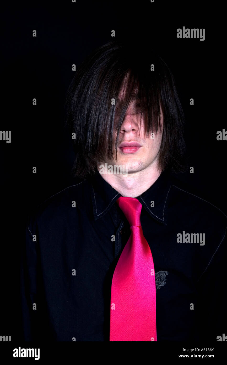 Forlorn look from a young boy aged 16 Stock Photo - Alamy