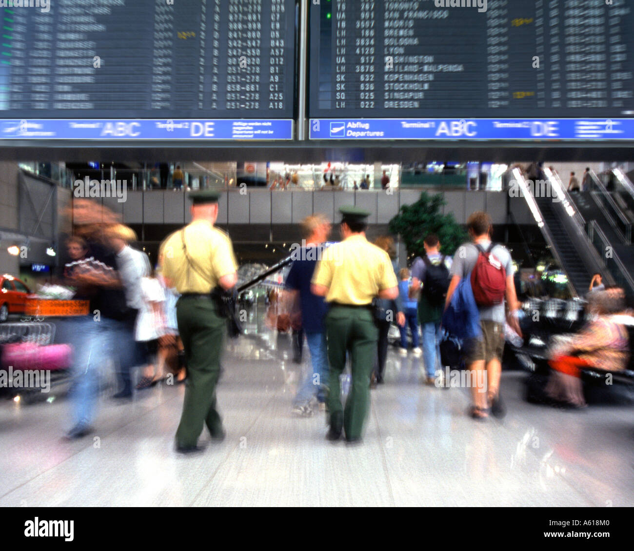 Crowd of people at airport Stock Photo - Alamy