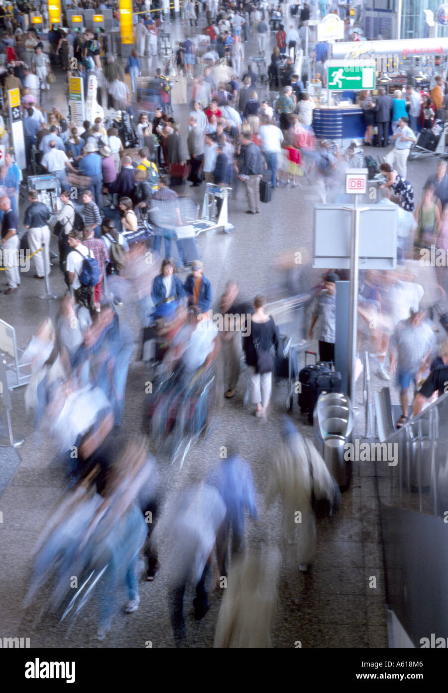 Crowd of passengers in airport hall Stock Photo - Alamy