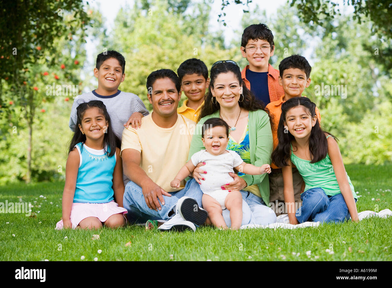 Portrait of Hispanic family in grass Stock Photo - Alamy