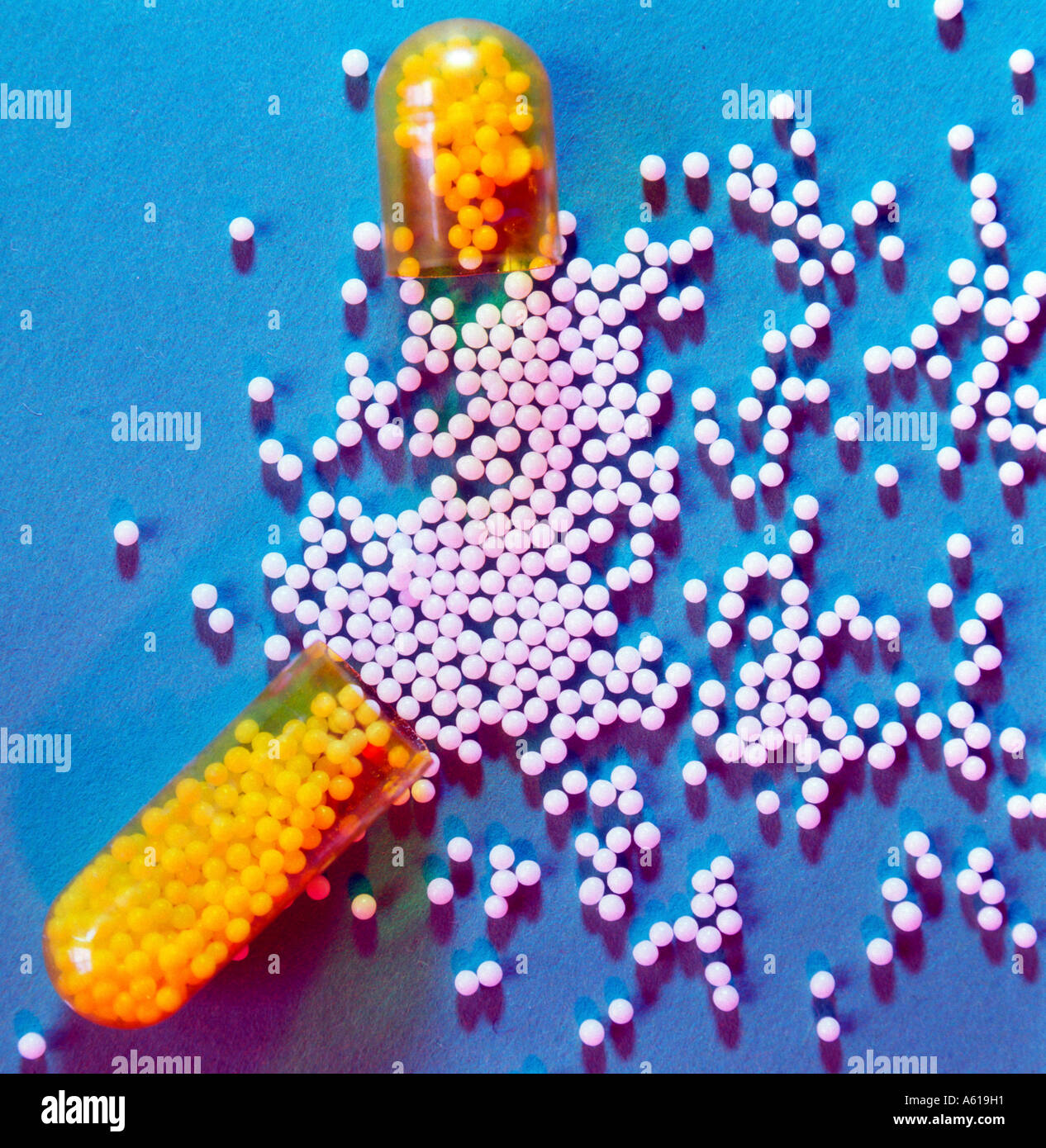 Close-up of broken capsule Stock Photo - Alamy