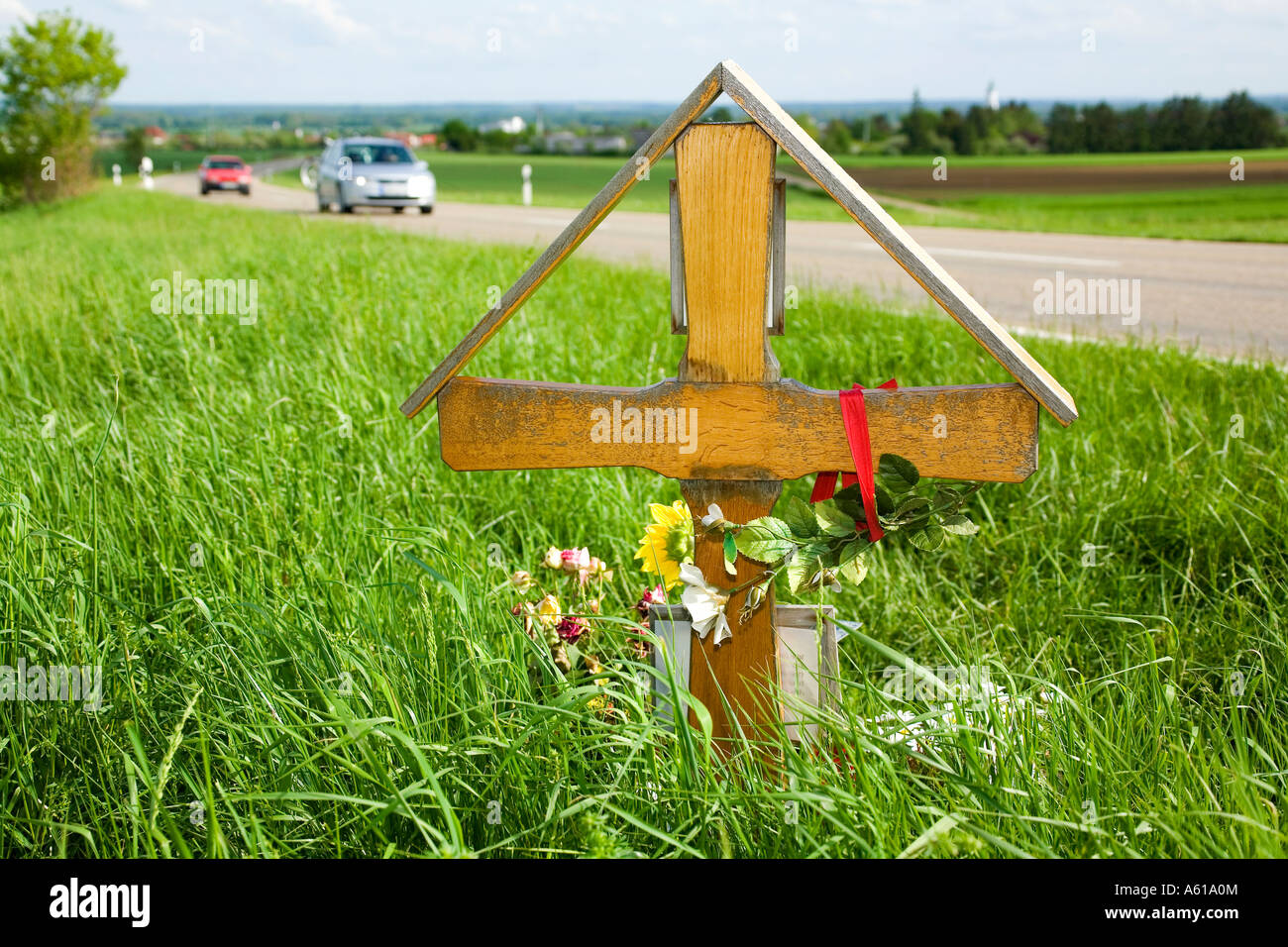 A cross at the roadside Stock Photo - Alamy