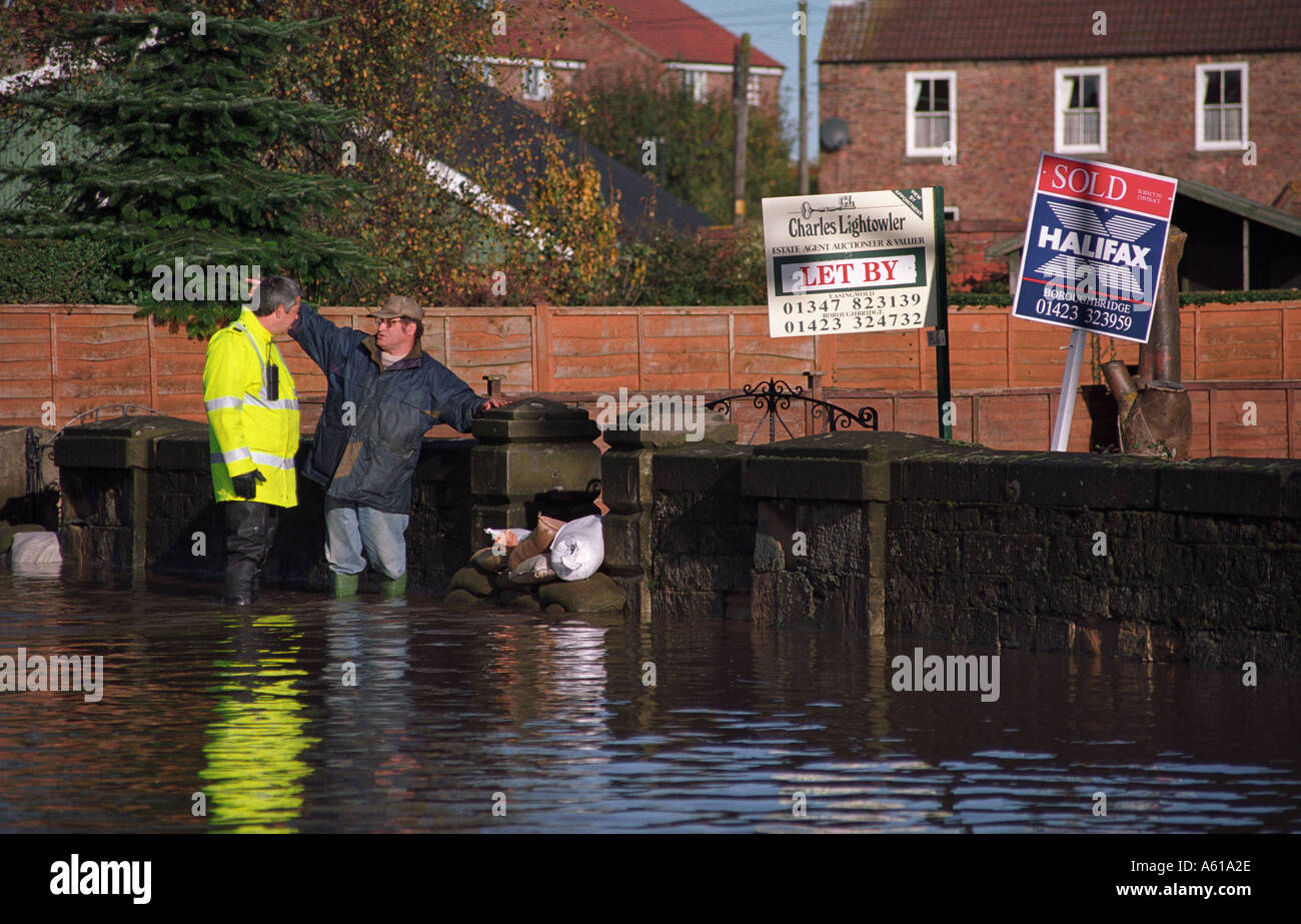 Homes for sale flooding hi-res stock photography and images - Alamy