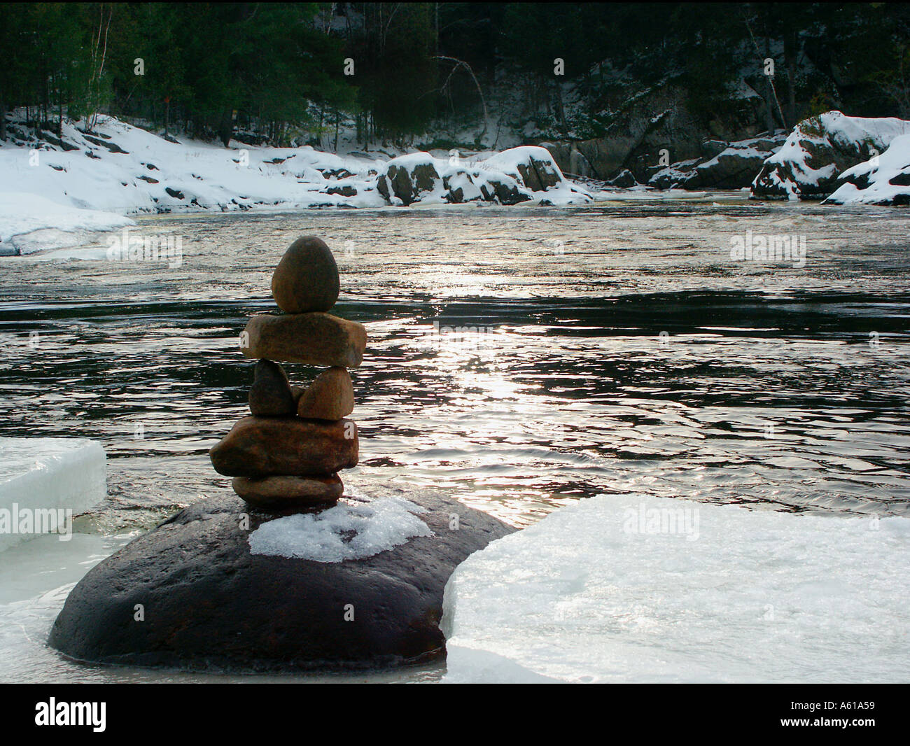 Inuksuk overlooking the Riviere Rouge in the Outaouais region Quebec ...