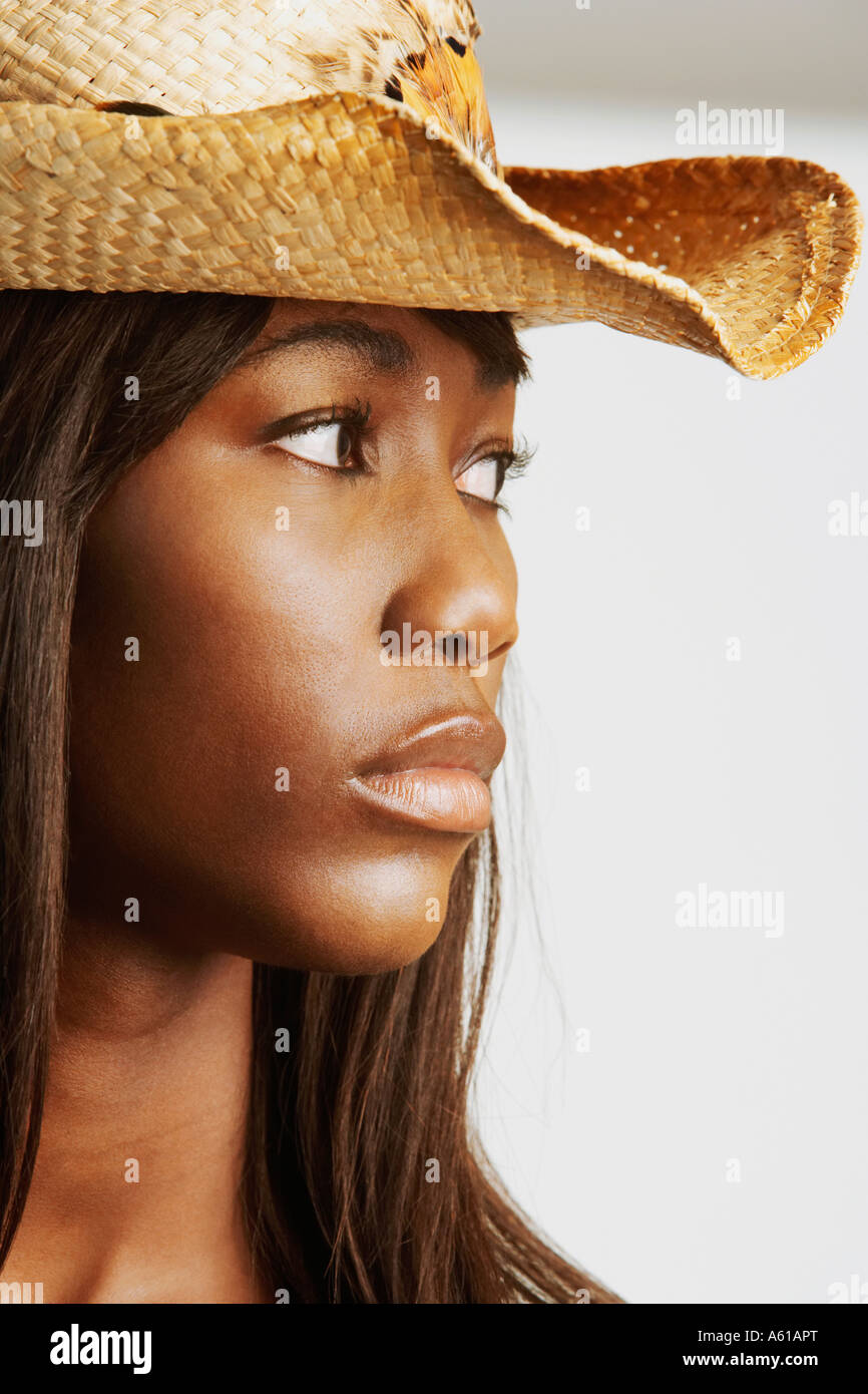 African woman wearing straw hat Stock Photo - Alamy